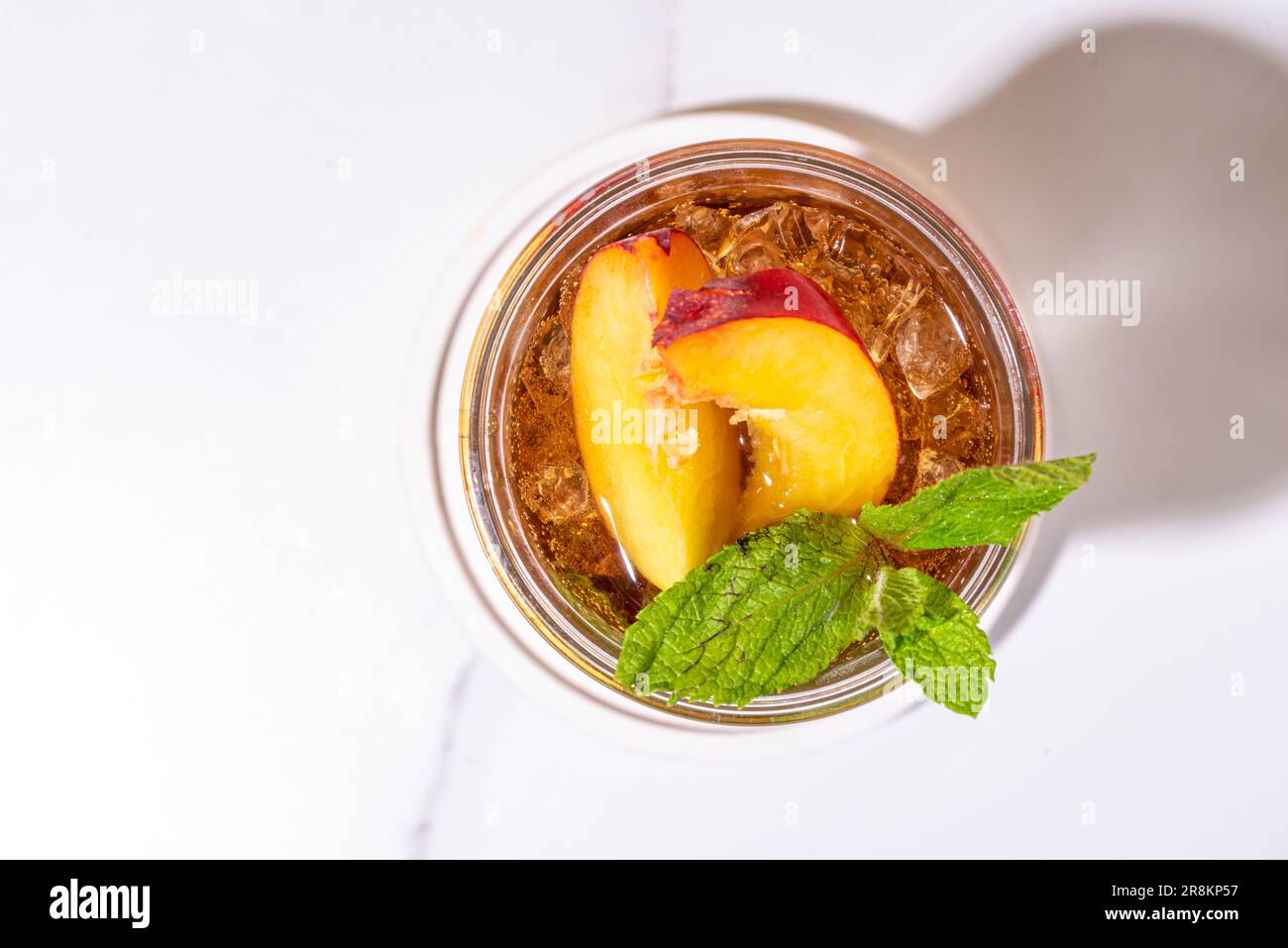 Iced peach tea, or peach lemonade with lime, mint,crushed ice and bar ...
