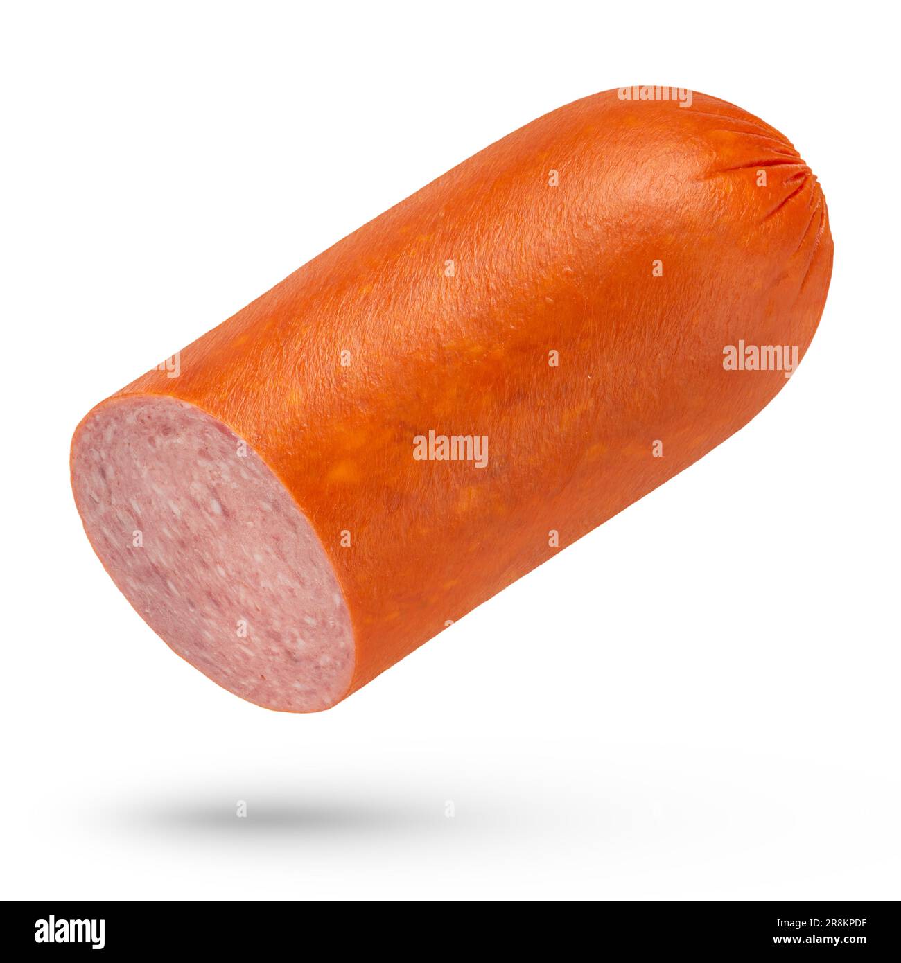 Salami sausage on a white isolated background. Hot smoked sausage, cut in half, falls on a white ...