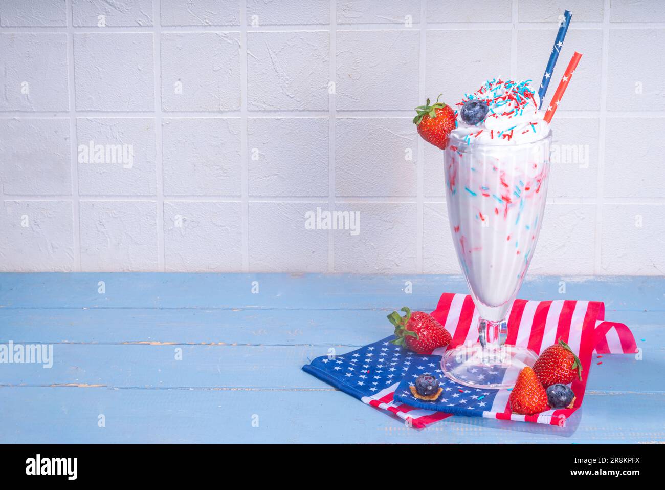 Patriotic USA American loaded milkshake, sweet dessert with red, white ...