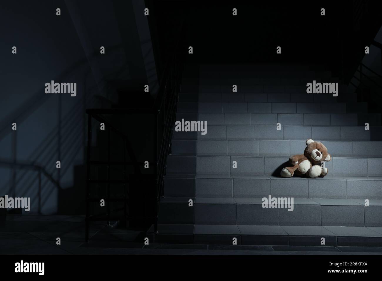 Teddy bear on stairs hi-res stock photography and images - Alamy