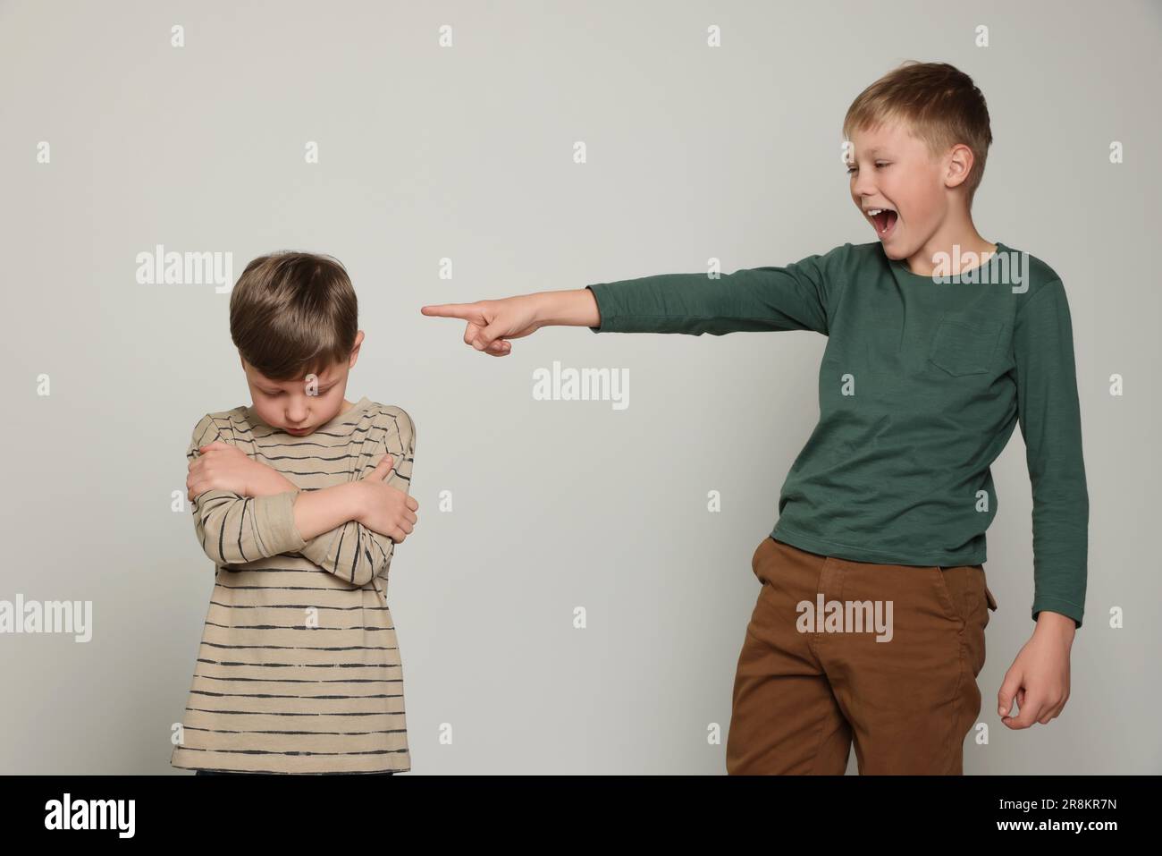 Little Kids Pointing And Laughing