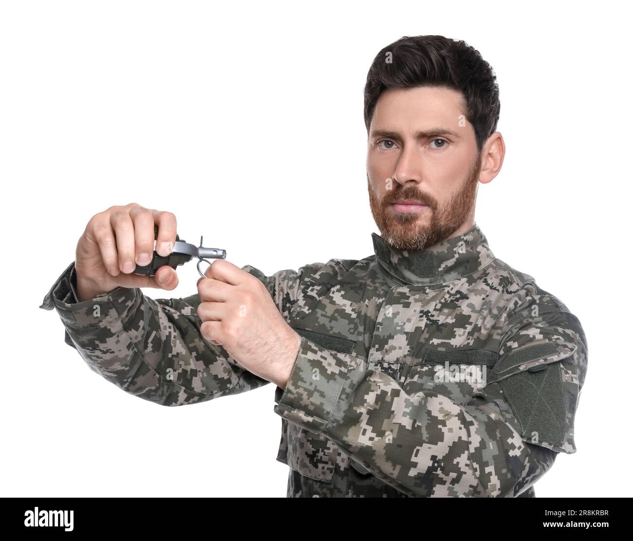 Soldier pulling safety pin out of hand grenade on white background ...