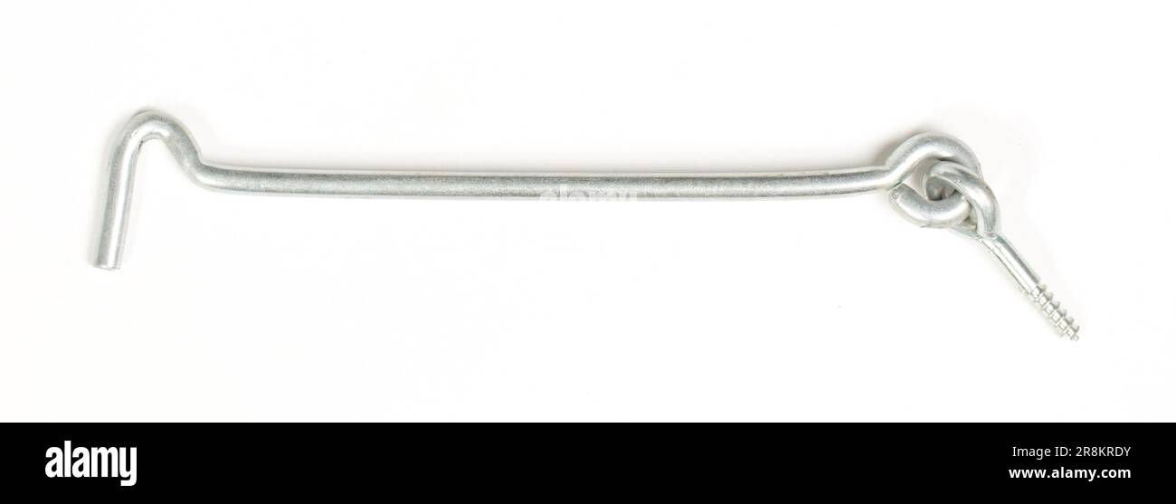Old-fashioned window latch hook hanging on a white background Stock ...