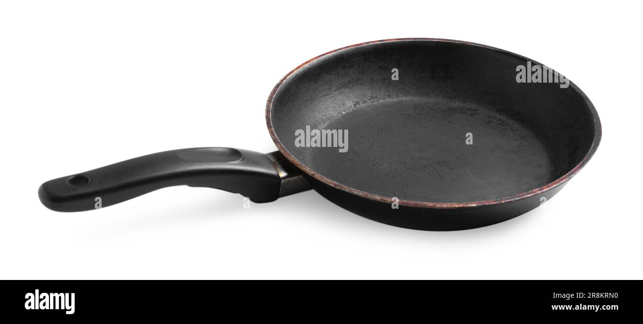 Dirty old non-stick frying pan on white background Stock Photo - Alamy