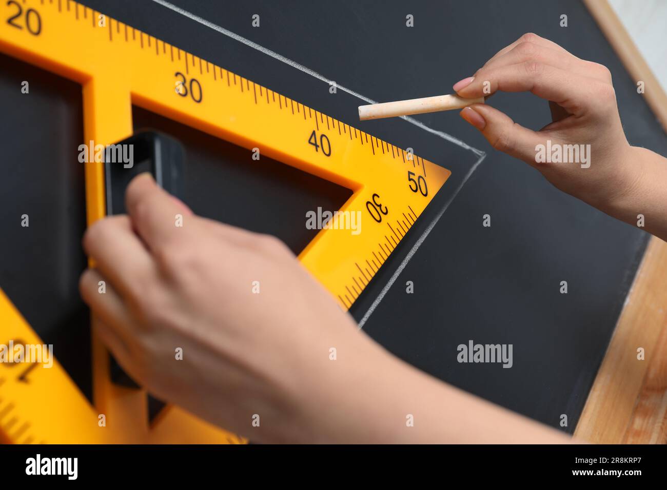 Hands measuring angle by protractor hi-res stock photography and images ...