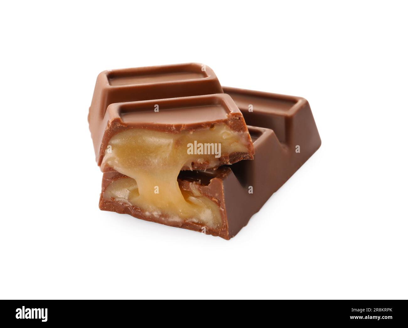 Pieces of delicious chocolate bar on white background Stock Photo - Alamy