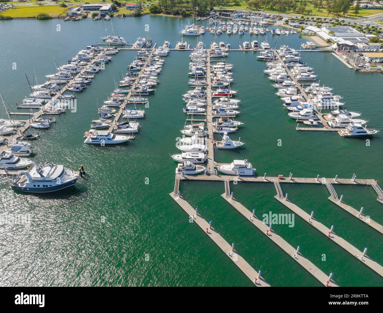 Aerial view of boats lined up at anchor at a marina at Southport on the ...