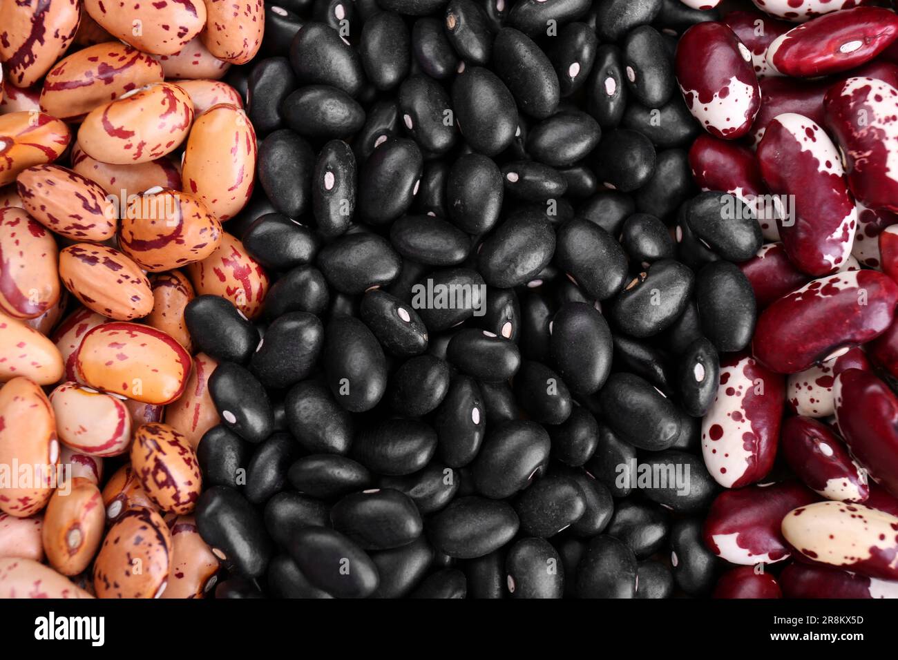 Different kinds of beans as background, closeup Stock Photo - Alamy