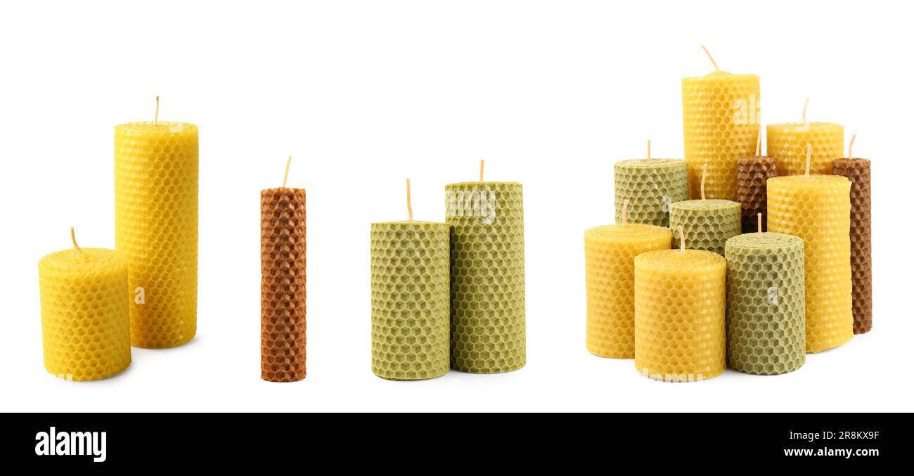 Set of beeswax candles on white background Stock Photo - Alamy