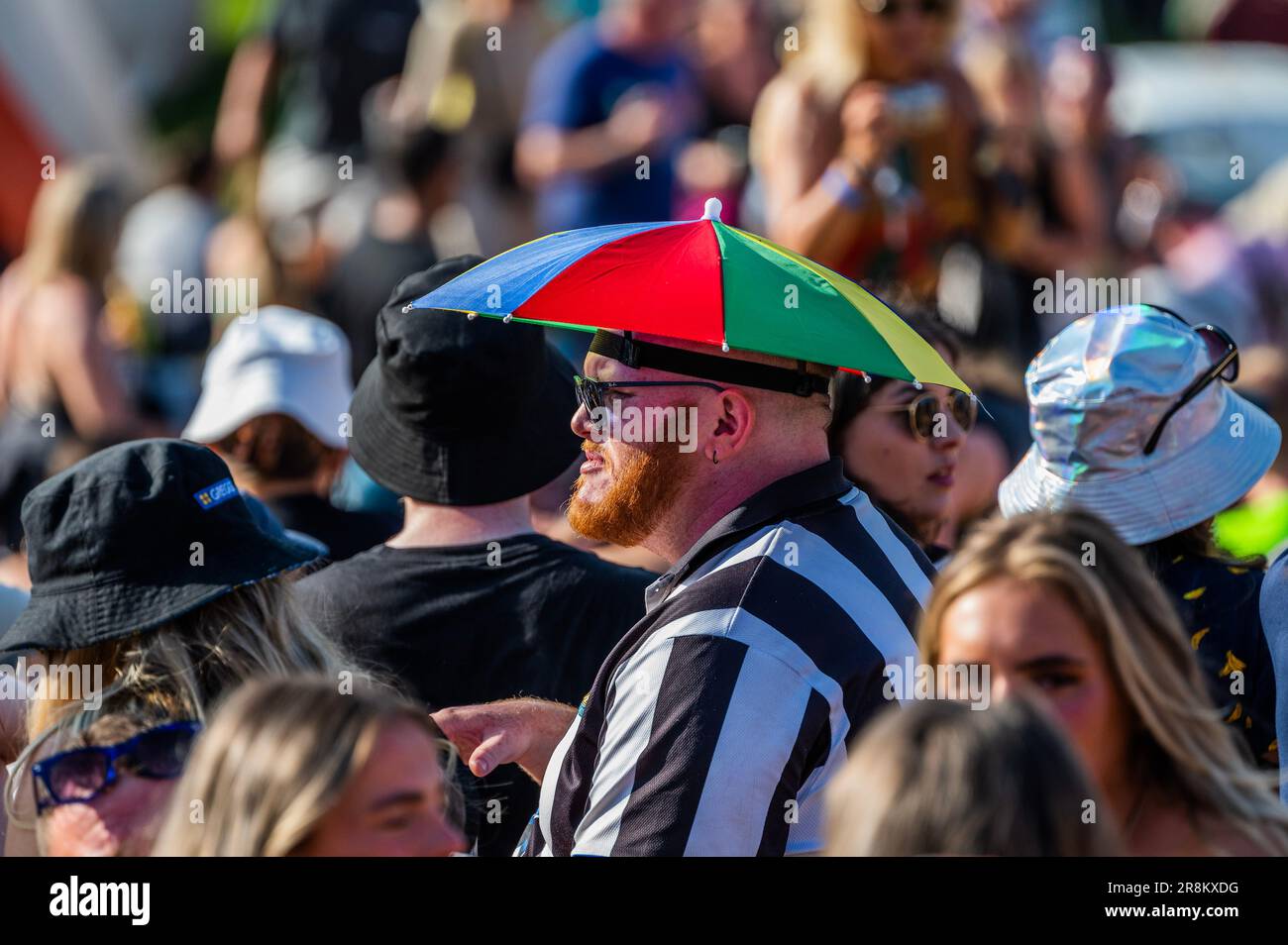 Glastonbury, UK. 21st June, 2023. Enjoying the evening sun on the ...