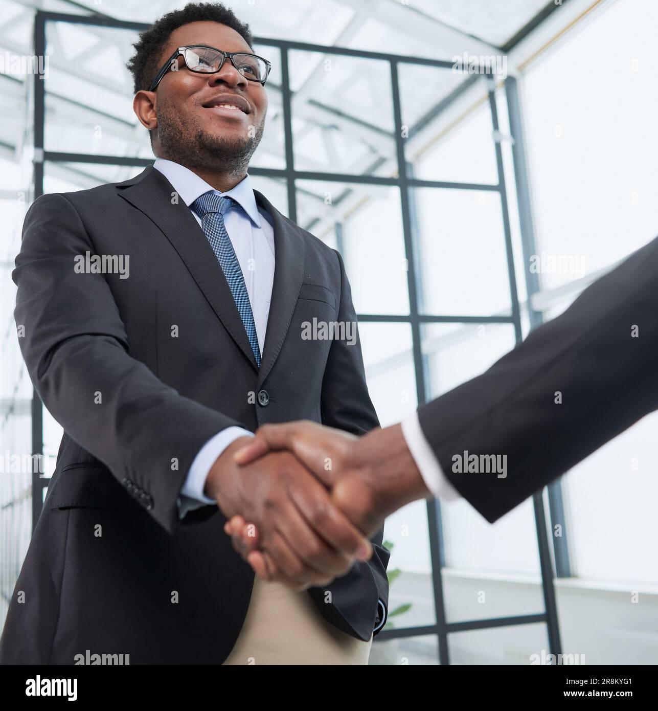Two business men shaking hands together after successful meeting Stock ...