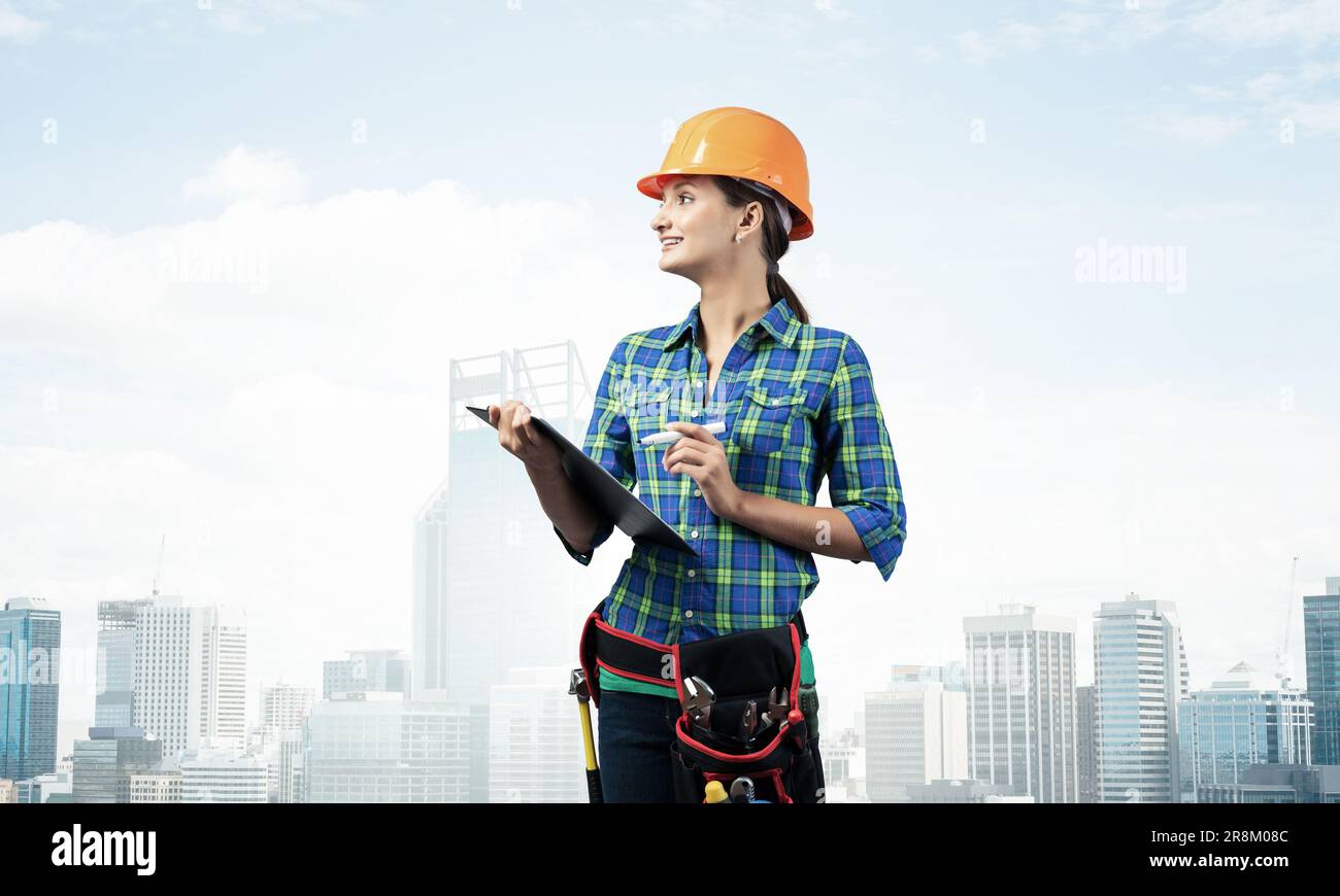 Young building inspector checking outdoor Stock Photo - Alamy