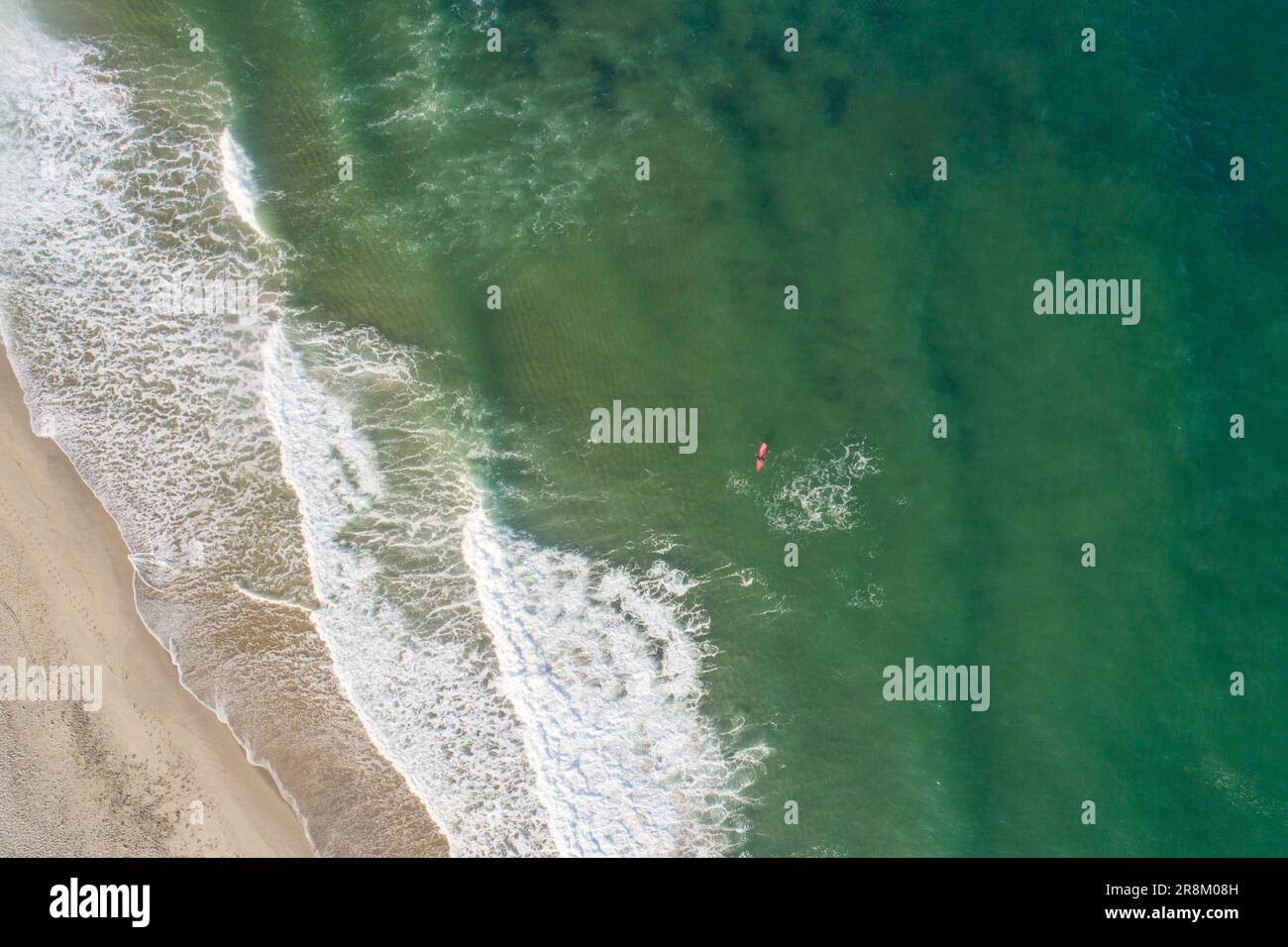 Aerial view blue ocean surfer hi-res stock photography and images - Alamy