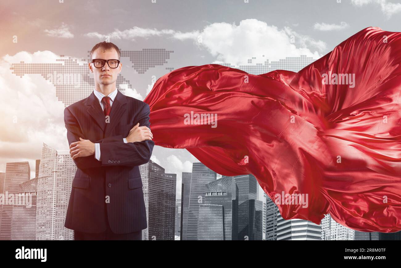 Concept of power and sucess with businessman superhero in big city ...