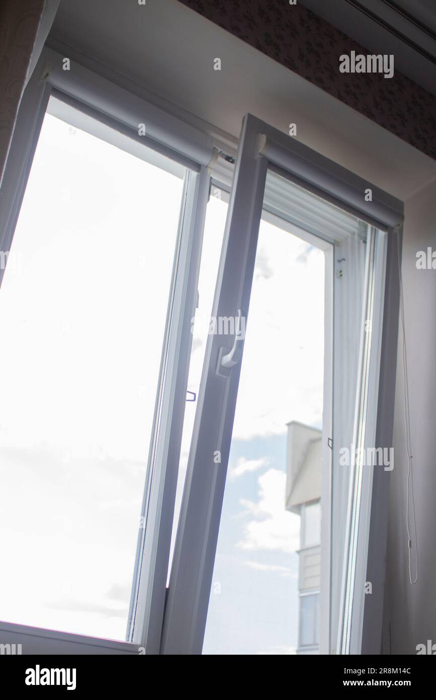 White bright vertical window in a flat Stock Photo - Alamy