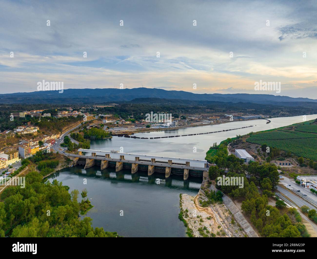 Aerial view of the Flix reservoir next to the town in the Ebro riverbed ...