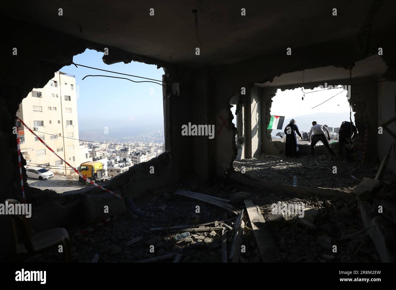 Nablus, Palestinian Territories. 22nd June, 2023. People inspect a flat ...