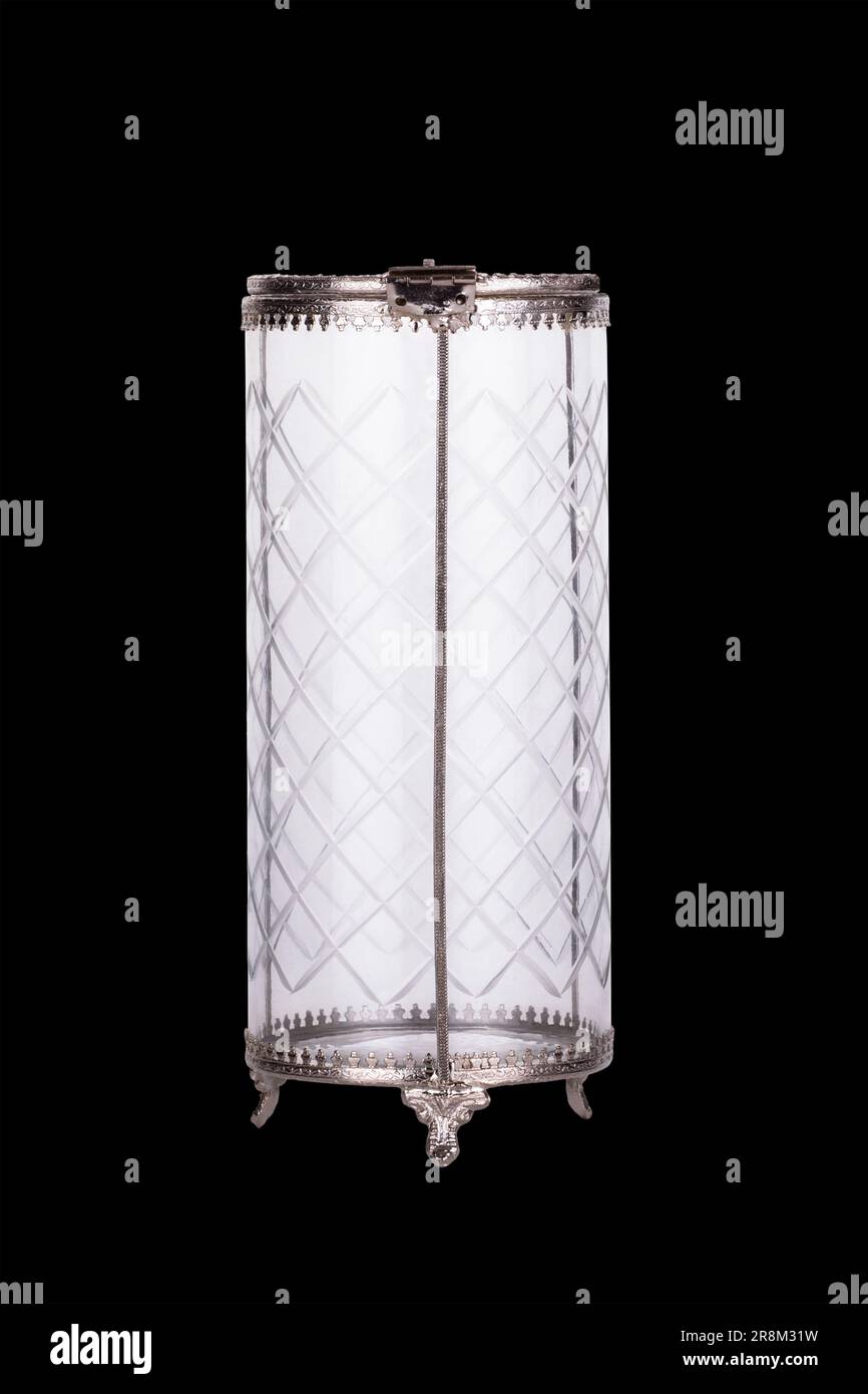 round glass metal decorative candle lantern with lid isolated on black ...
