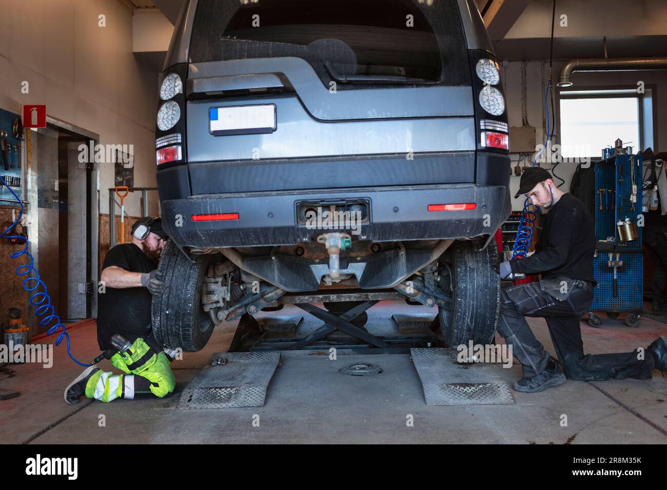 Mechanics work in car hi-res stock photography and images - Alamy