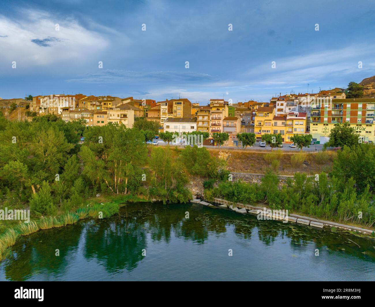 Aerial view of the village of Flix next to the Ebro river (Ribera d ...