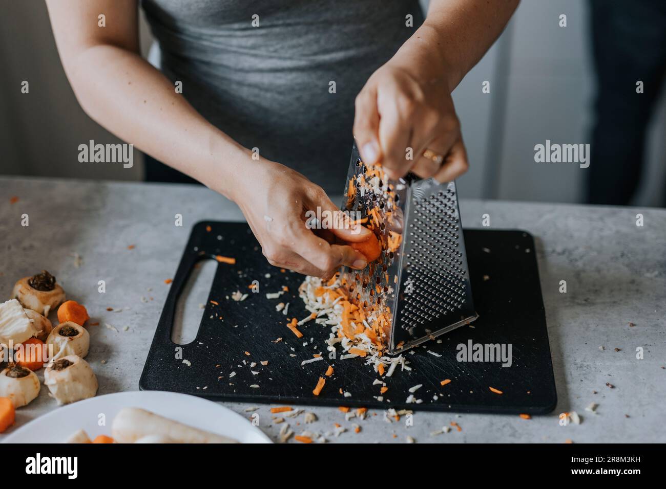 Grating vegetables hi-res stock photography and images - Alamy
