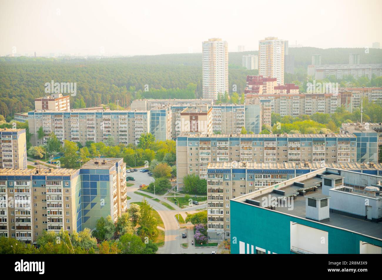 smog smoke over city. panel buildings, tower, street, road, mountains ...