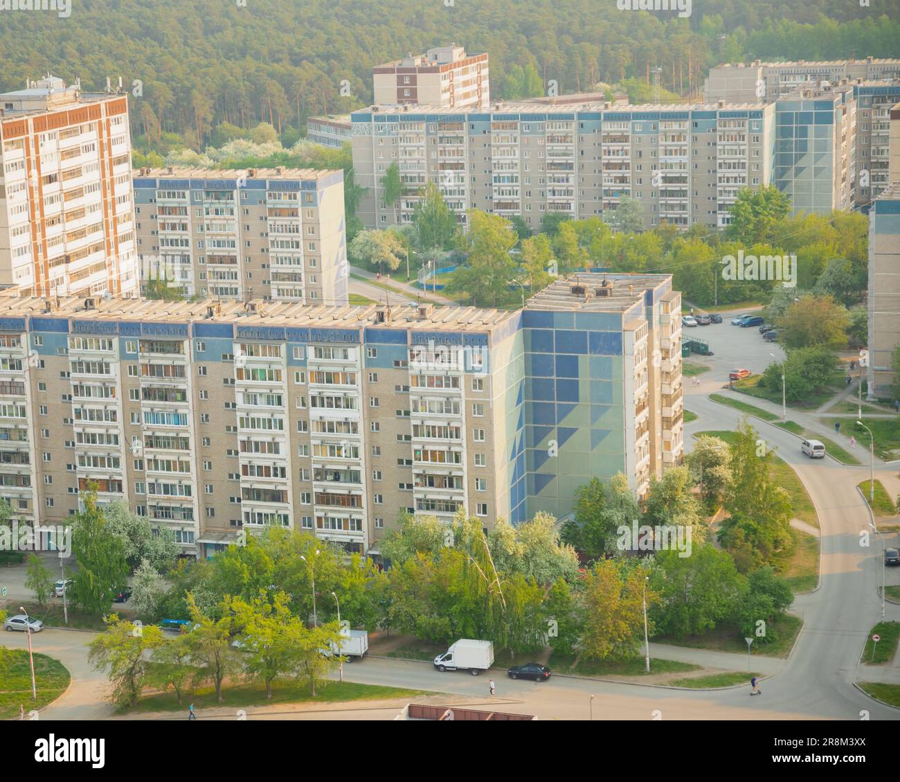 smog smoke over city. panel buildings, tower, street, road, mountains ...