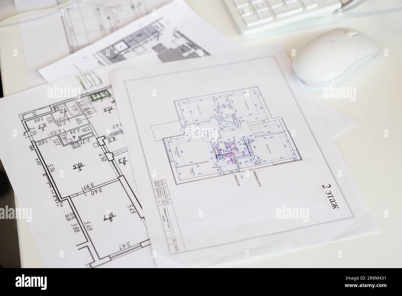 building architectural drawing, white computer mouse on white table ...