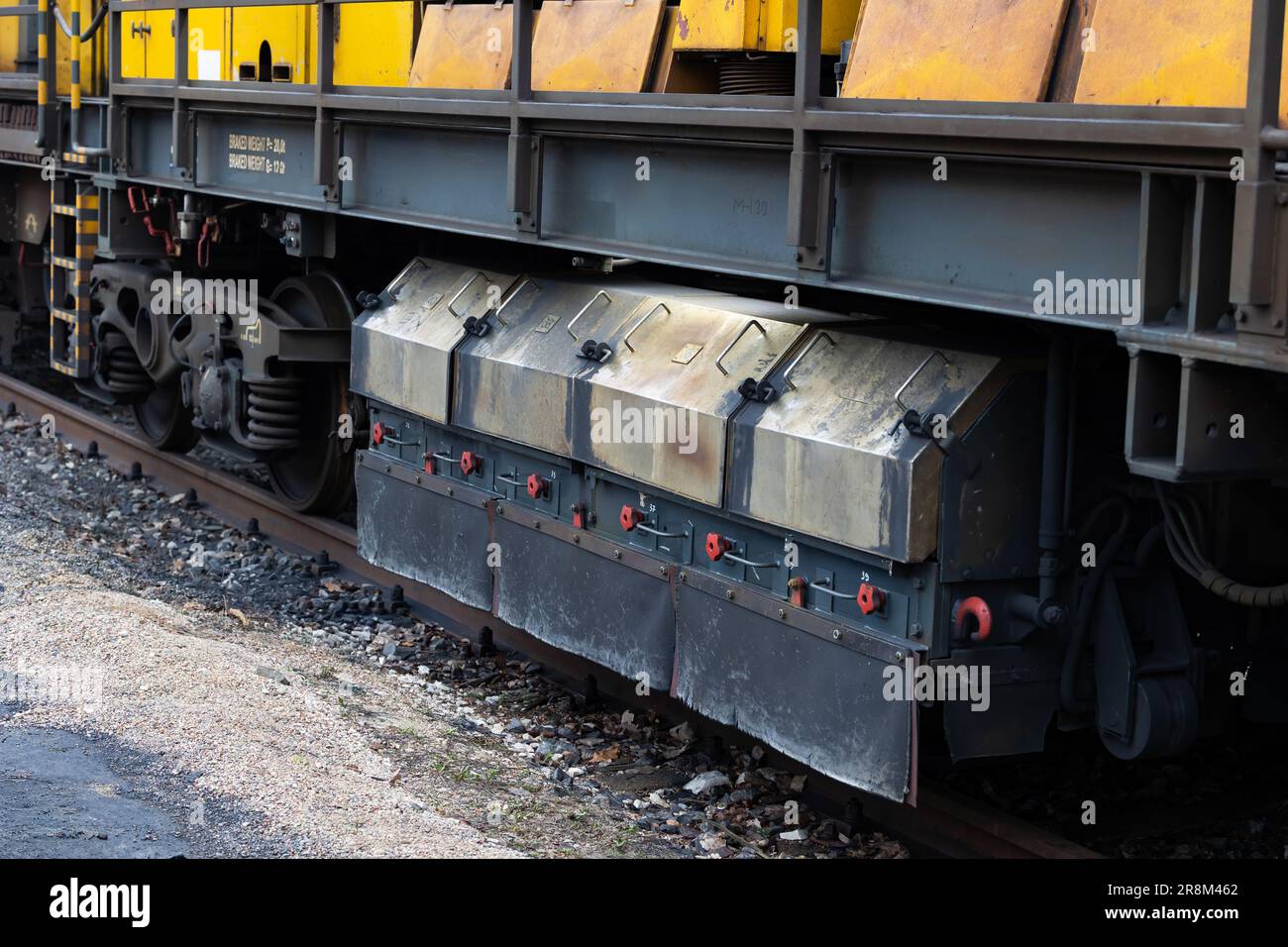 Yellow technical train for grinding rails standing on a railway siding ...
