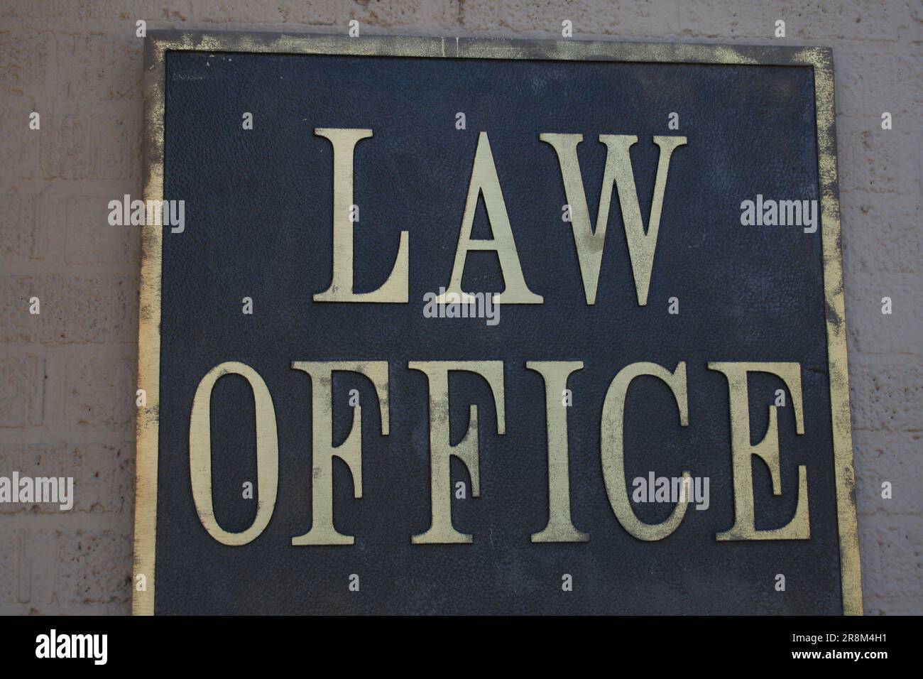 Retro Law Office Sign on Wall of Downtown Building Stock Photo - Alamy