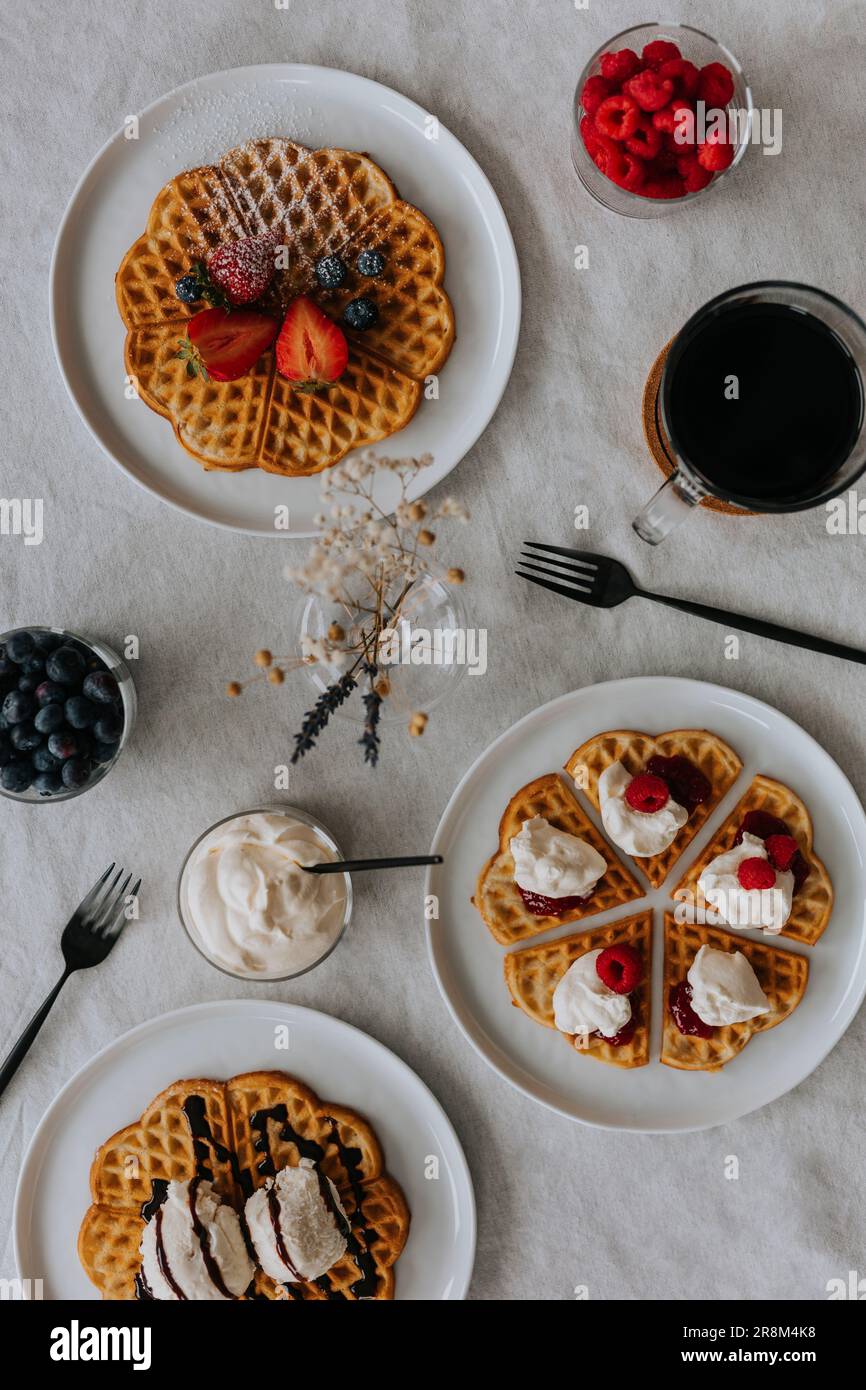 High angle view of waffles on plates Stock Photo - Alamy