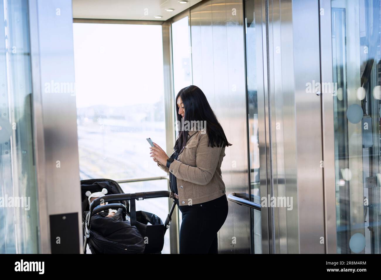 Woman lift elevator inside hi-res stock photography and images - Alamy