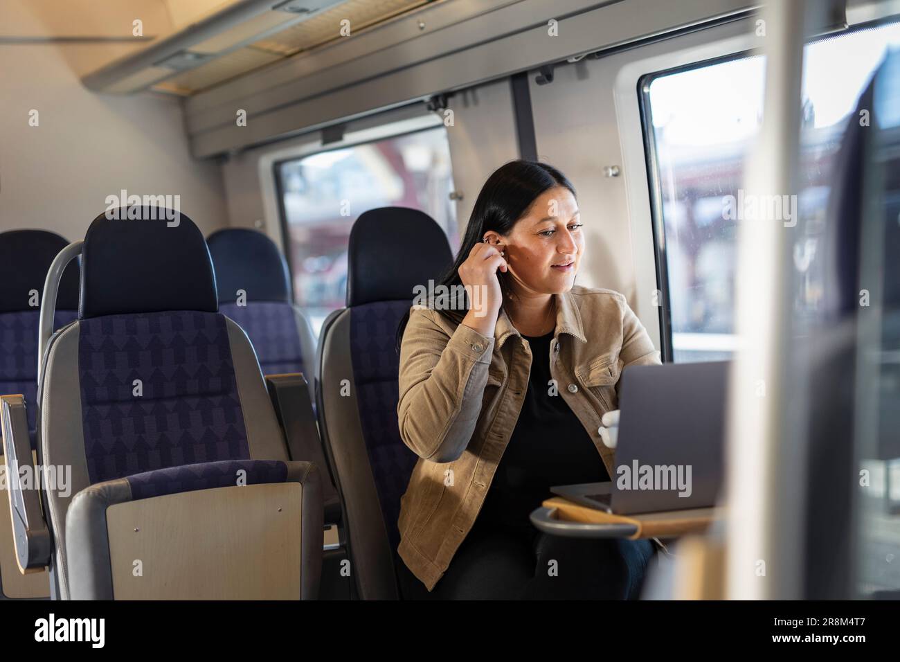 Adult family in the train hi-res stock photography and images - Alamy