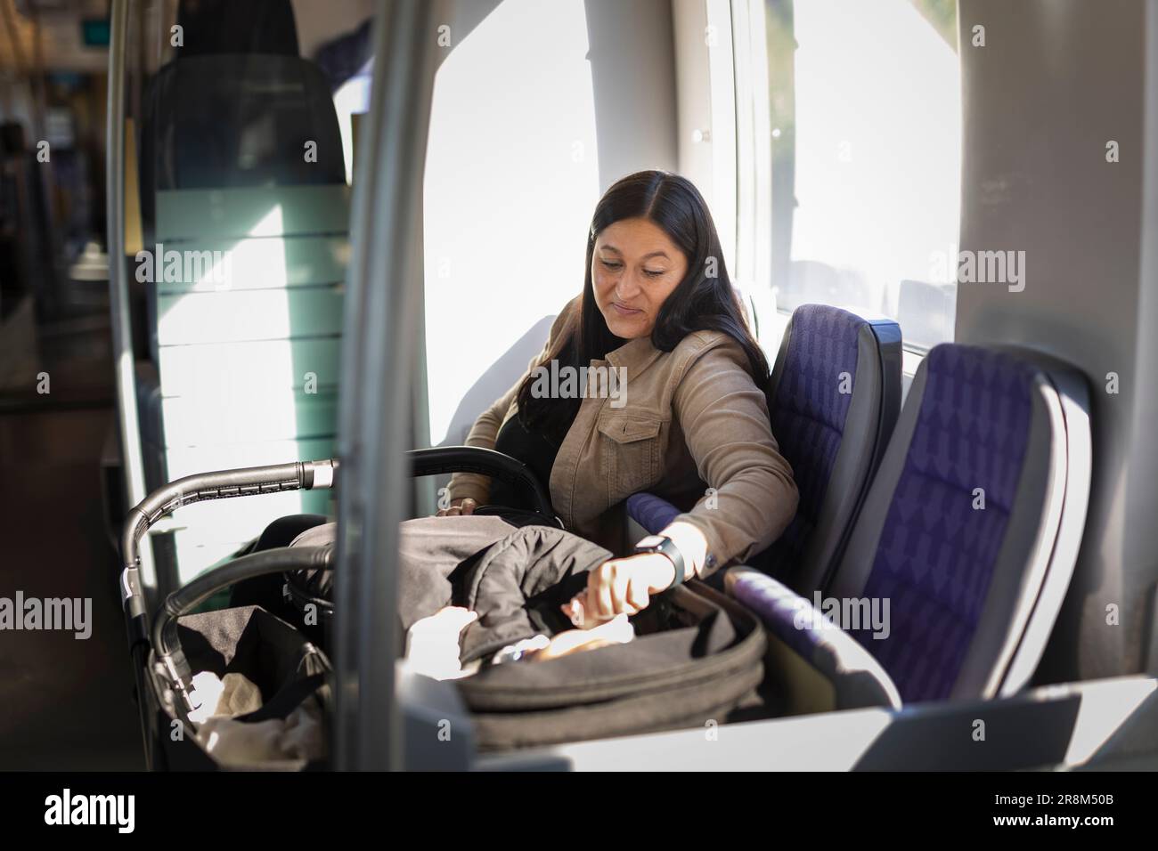 Suburban traffic train woman travelling hi-res stock photography and ...