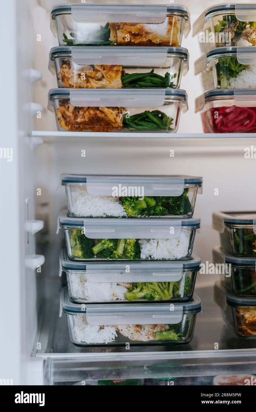 Fridge filled with lunch boxes as part of healthy meal prep Stock Photo ...