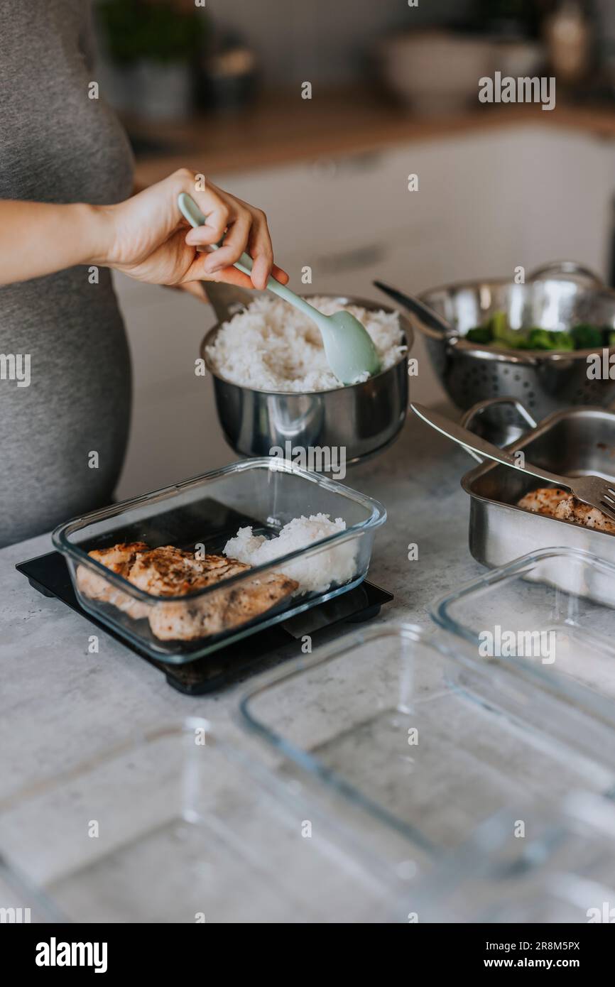Pregnant woman preparing healthy lunch box Stock Photo - Alamy