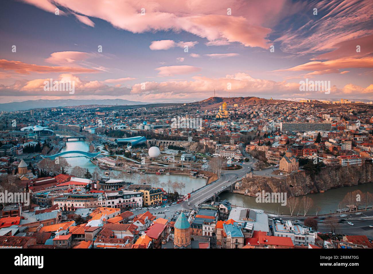 Tbilisi, Georgia. Top View Of Famous Landmarks In spring sunset Evening ...