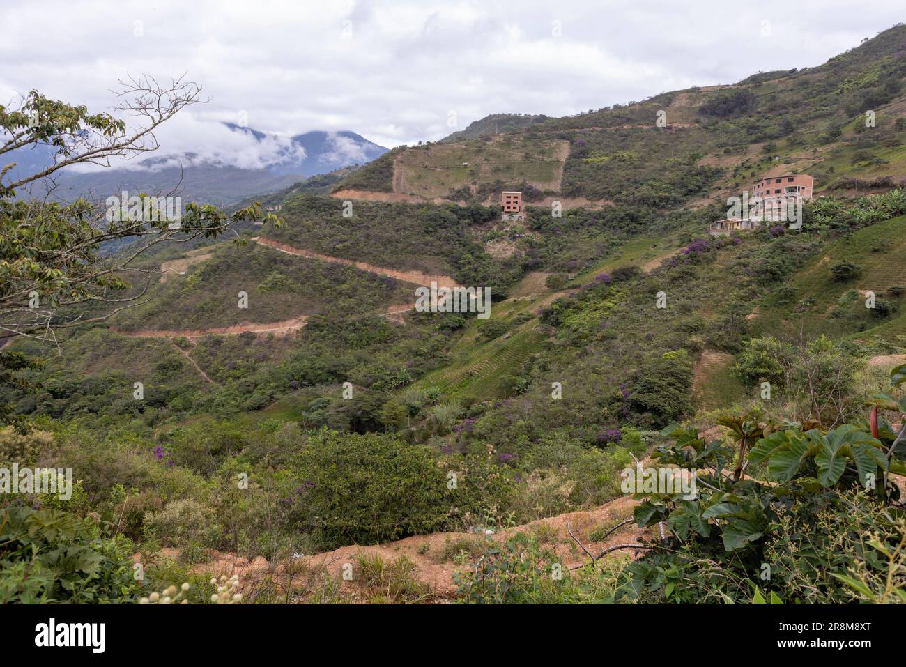 Scenic drive through the remote Bolivian Andes: passing small ...