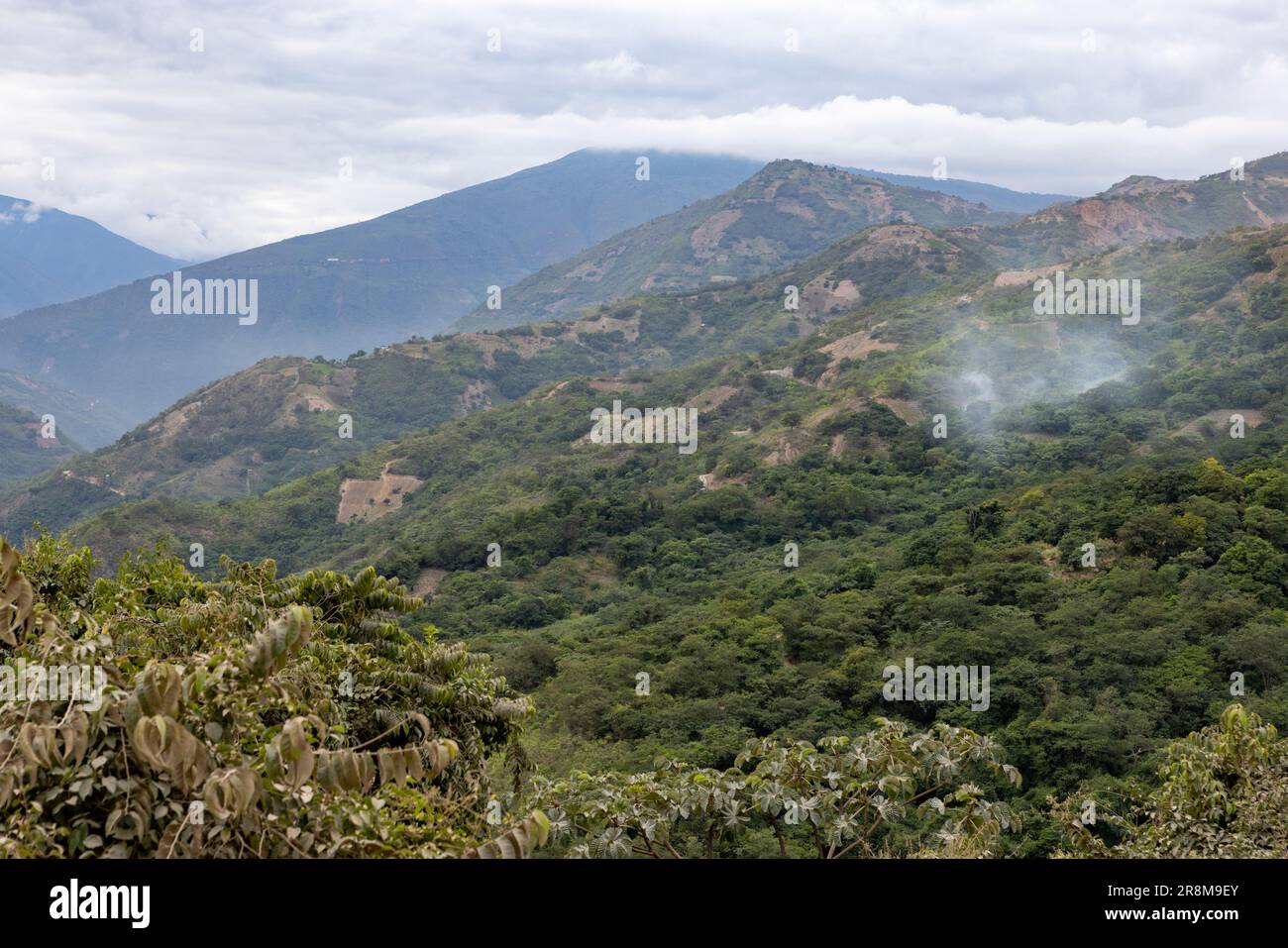 Scenic drive through the remote Bolivian Andes: passing small ...