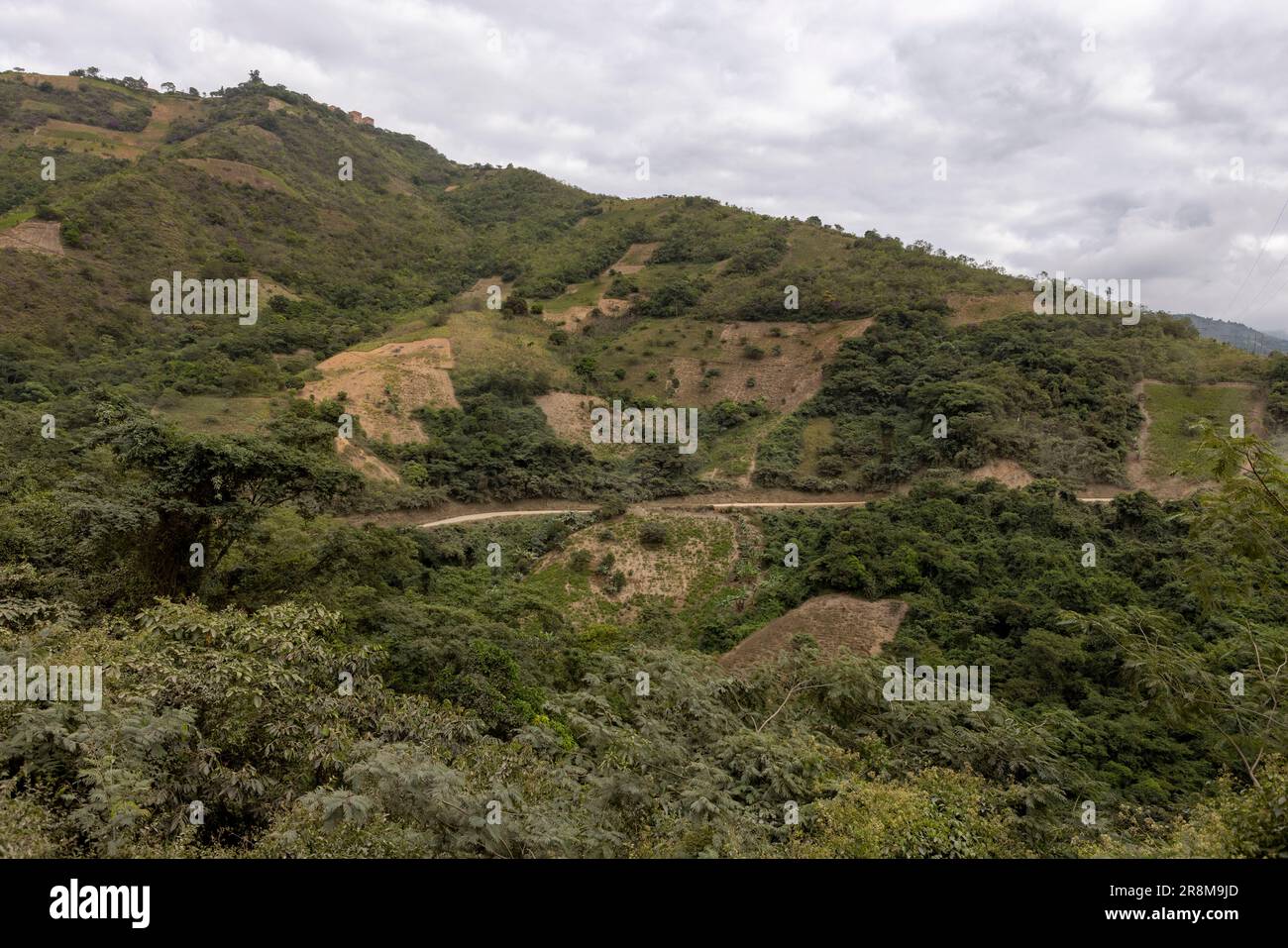 Scenic drive through the remote Bolivian Andes: passing small ...