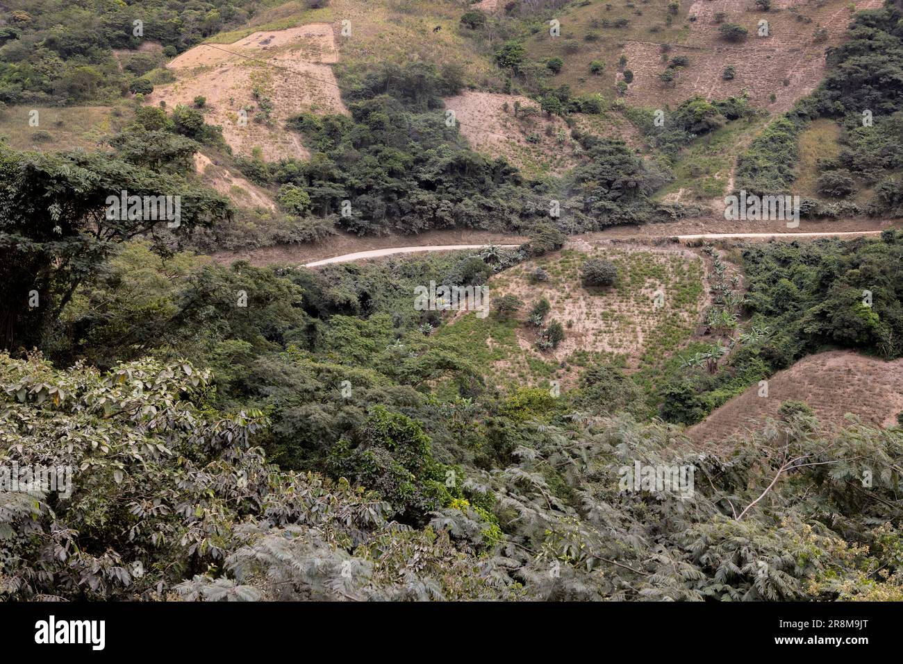 Scenic drive through the remote Bolivian Andes: passing small ...