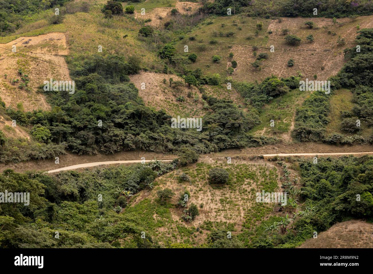 Scenic drive through the remote Bolivian Andes: passing small ...
