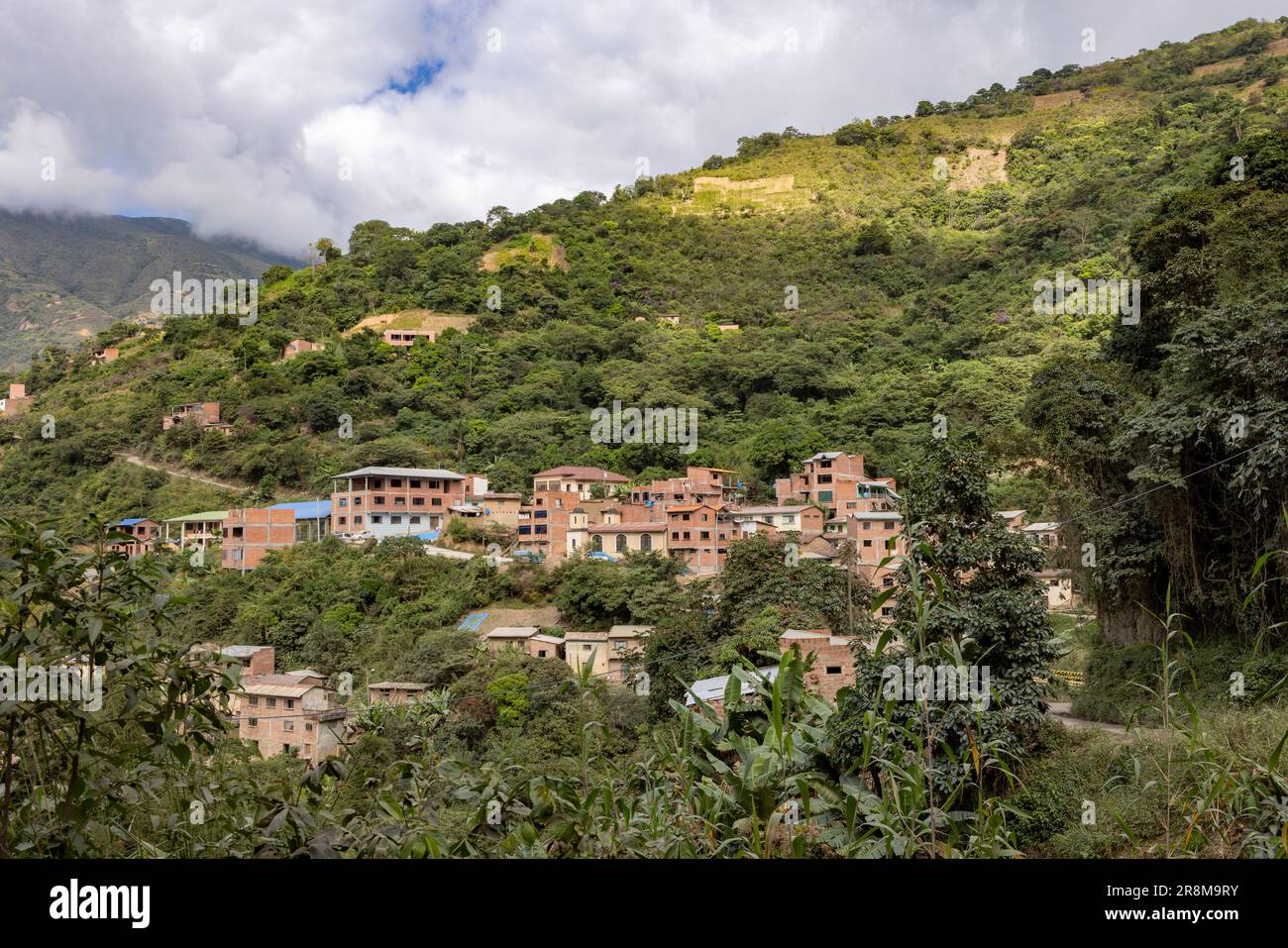 Scenic drive through the remote Bolivian Andes: passing small ...