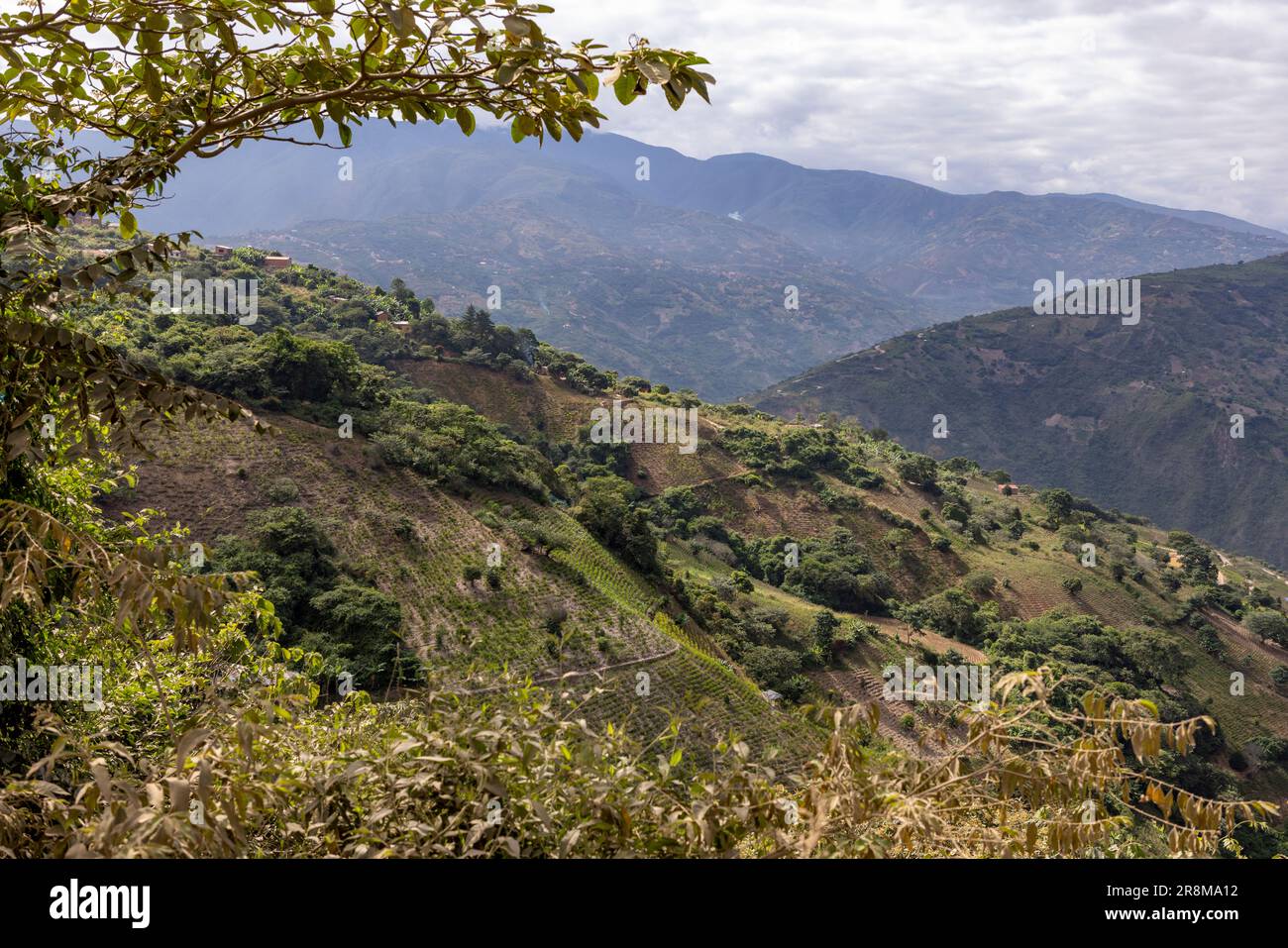 Scenic drive through the remote Bolivian Andes: passing small ...