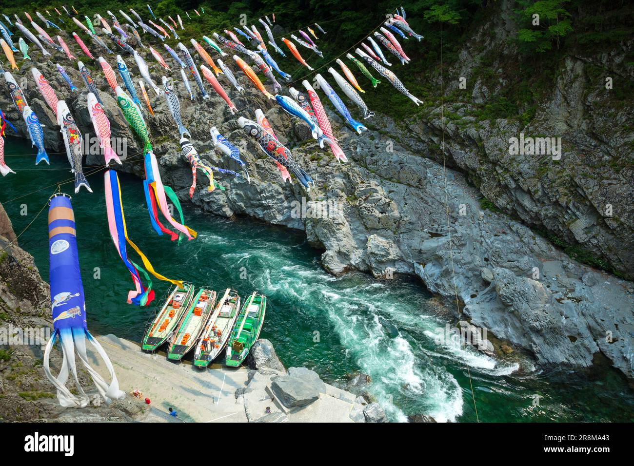 Sightseeing Boat and Carp Streamers in Oboke Gorge Stock Photo - Alamy