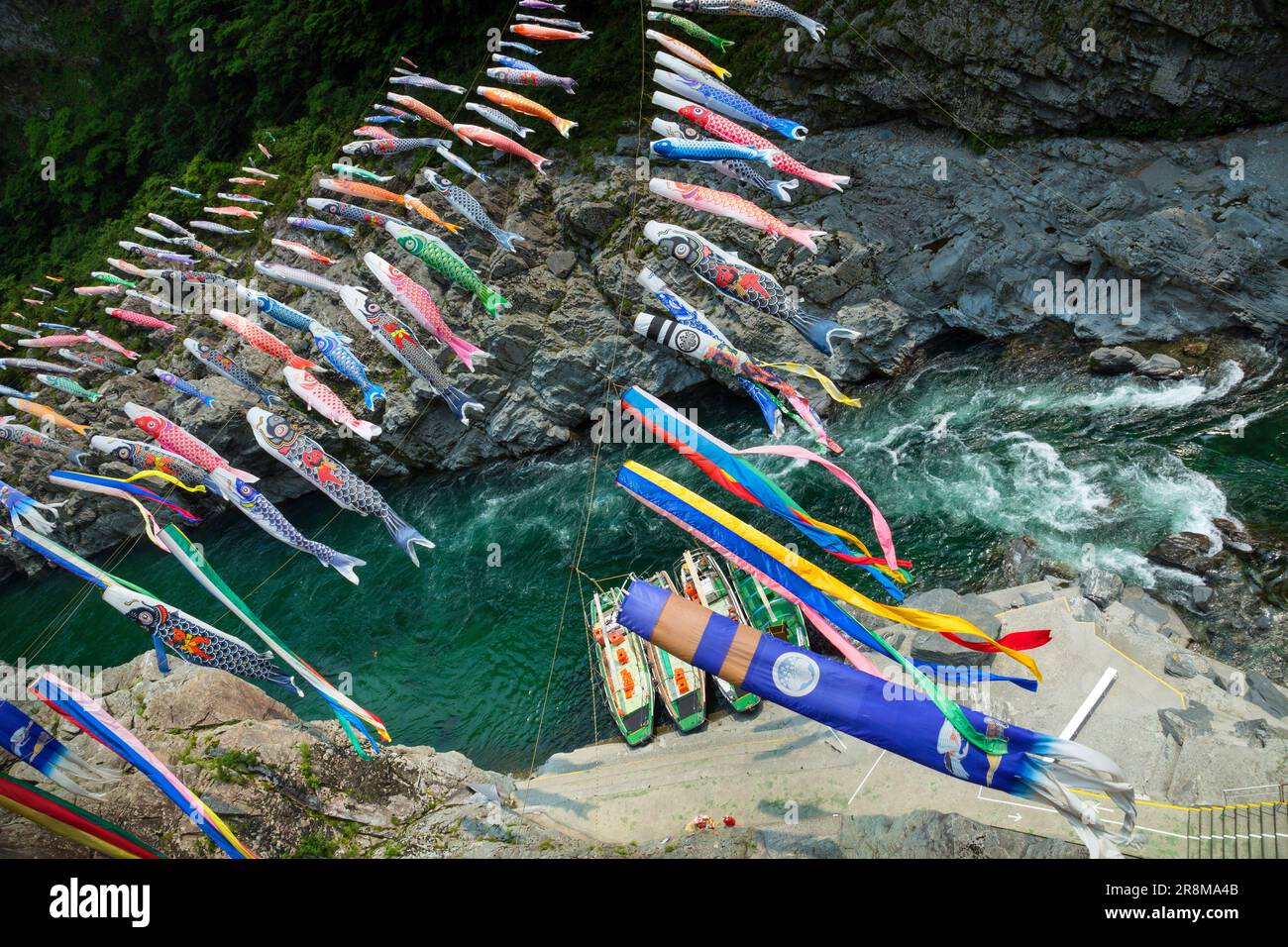 Sightseeing Boat and Carp Streamers in Oboke Gorge Stock Photo - Alamy