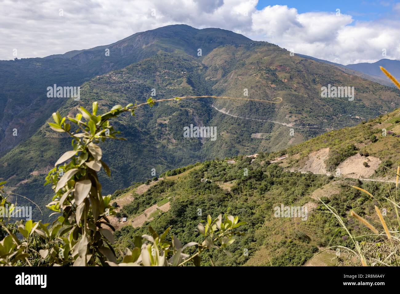 Scenic drive through the remote Bolivian Andes: passing small ...