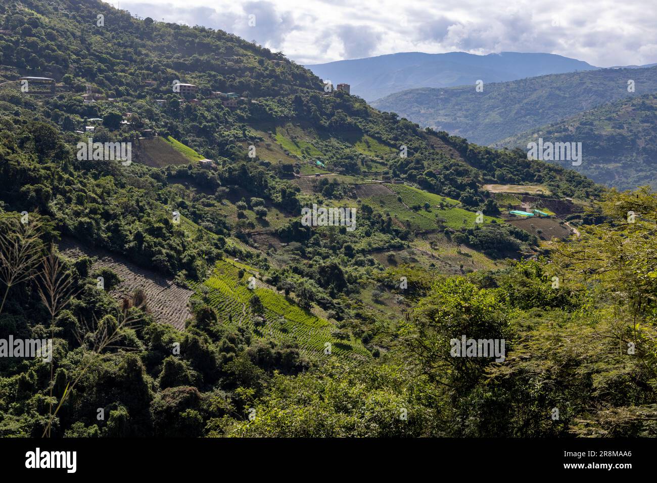 Scenic drive through the remote Bolivian Andes: passing small ...