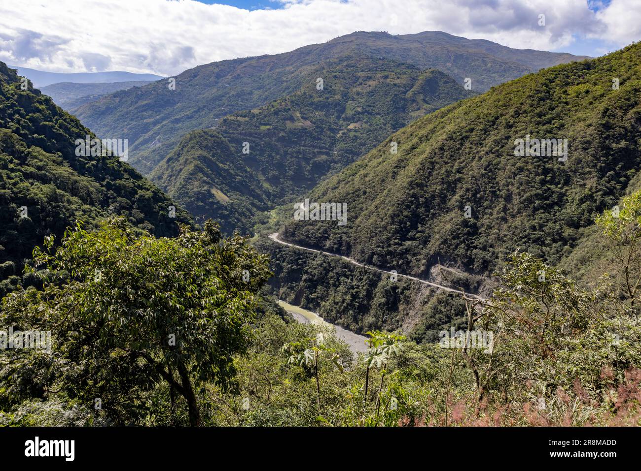 Scenic drive through the remote Bolivian Andes: passing small ...