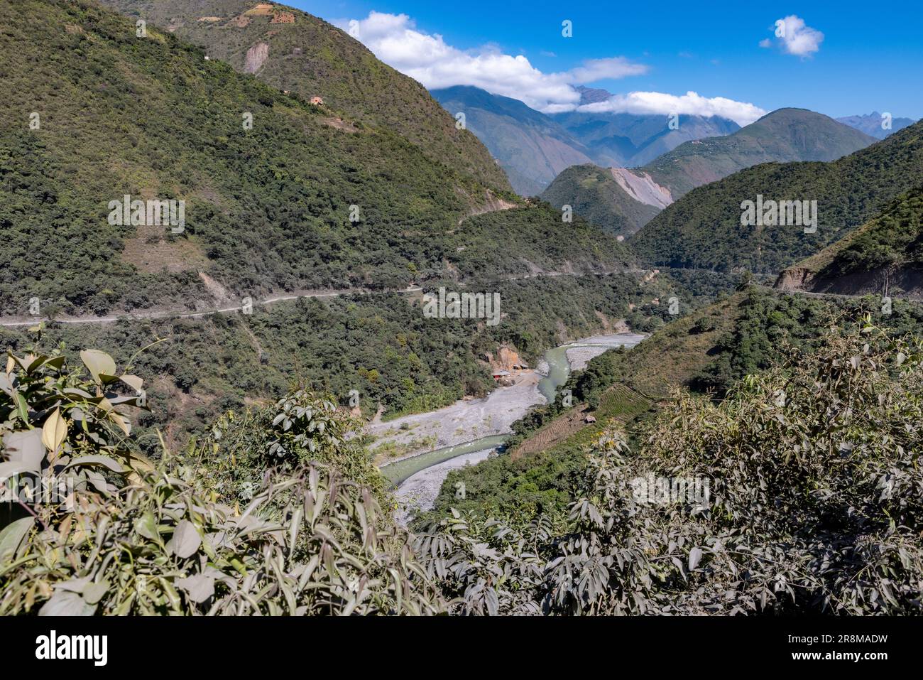 Scenic drive through the remote Bolivian Andes: passing small ...